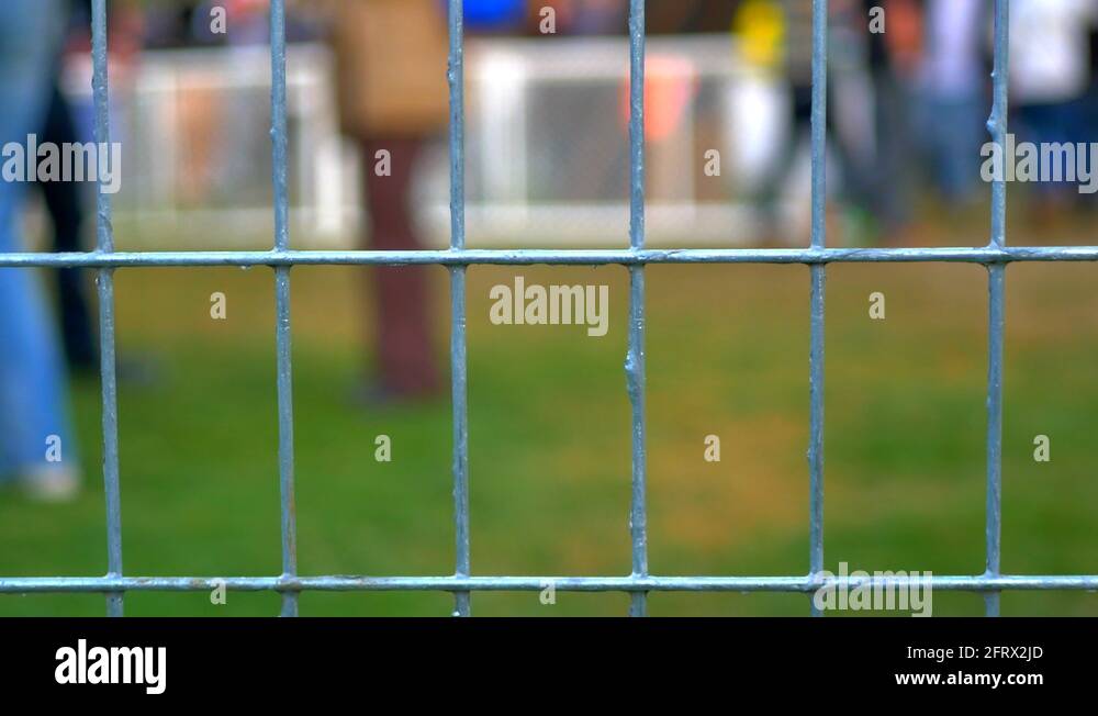 4K Mesh Wire Fence at Music Festival Concert, Crowd Background Stock ...