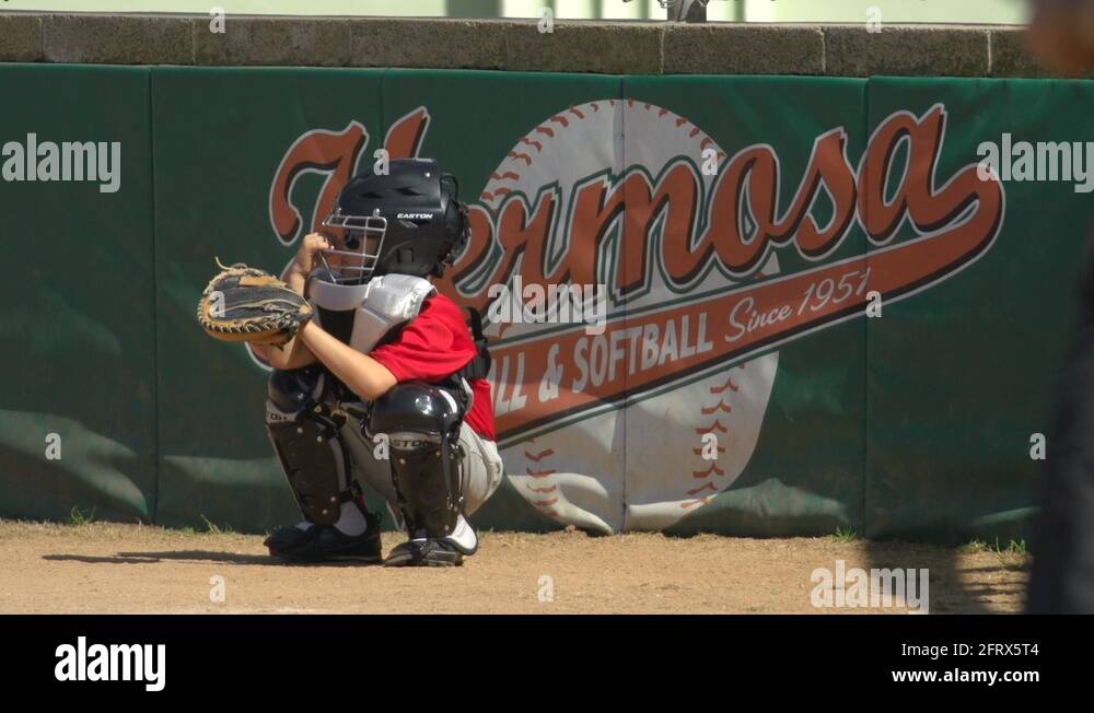 Kids playing little league baseball Stock Video Footage - Alamy