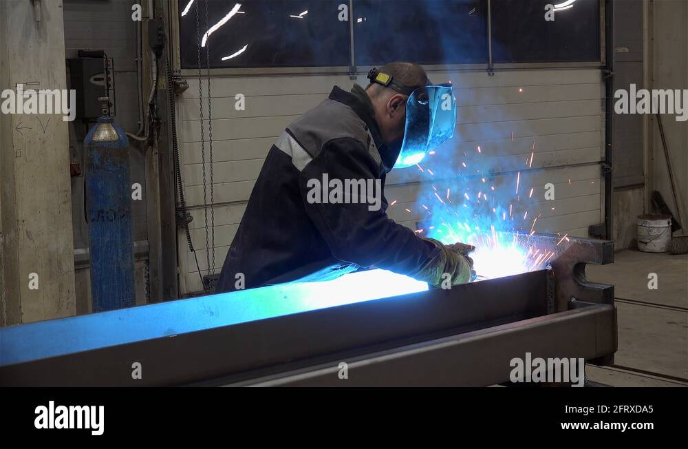 Gas metal arc welding (GMAW) of the beam rod at the Metal structures ...