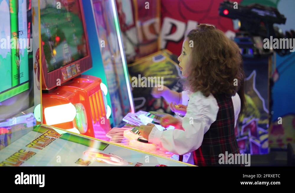 Girl playing in arcade Stock Videos & Footage - HD and 4K Video Clips ...
