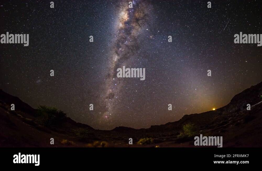 Milky Way and starry sky beyond mountain of the Namib desert, Namibia ...