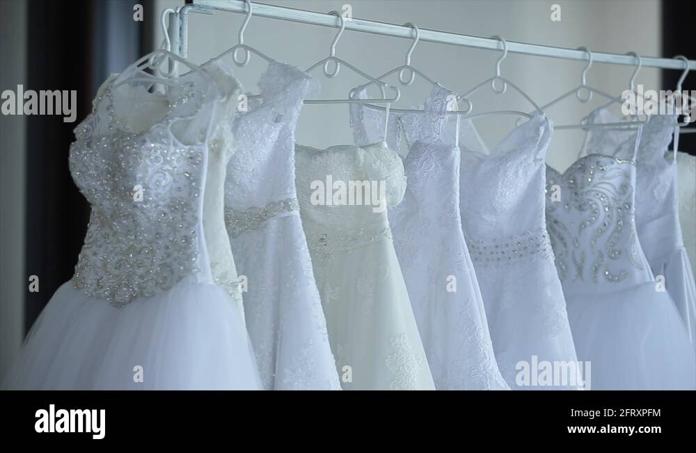 Dresses on racks Stock Videos & Footage - HD and 4K Video Clips - Alamy