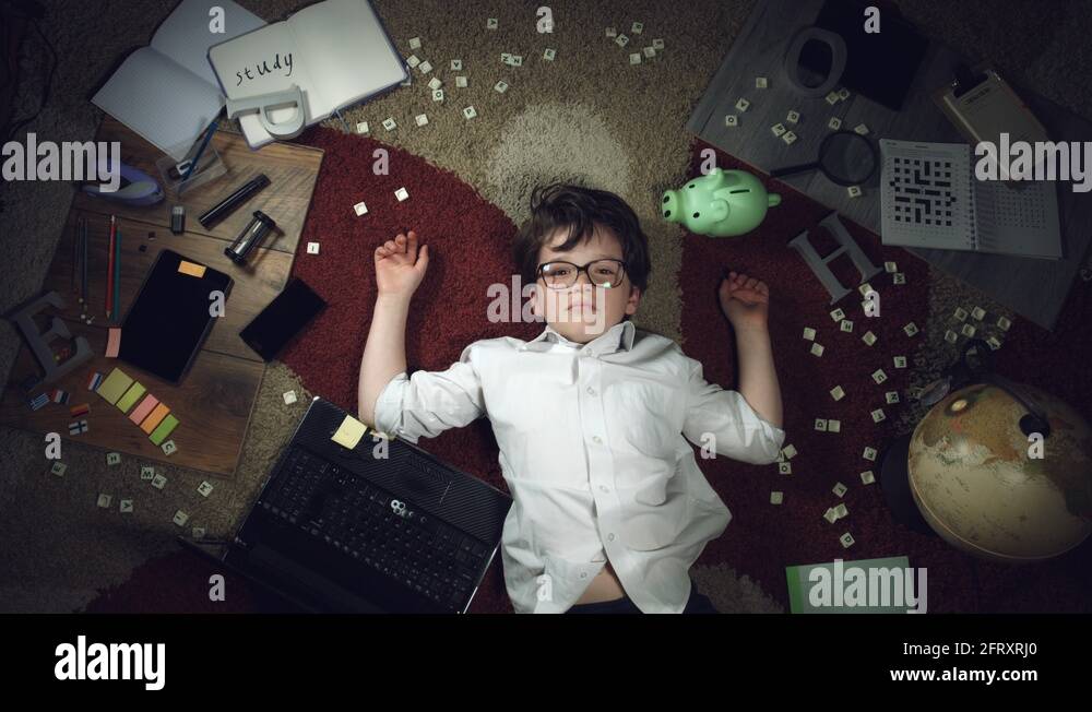 4k Above School Background of a Child Doing his Homework and Laughing ...