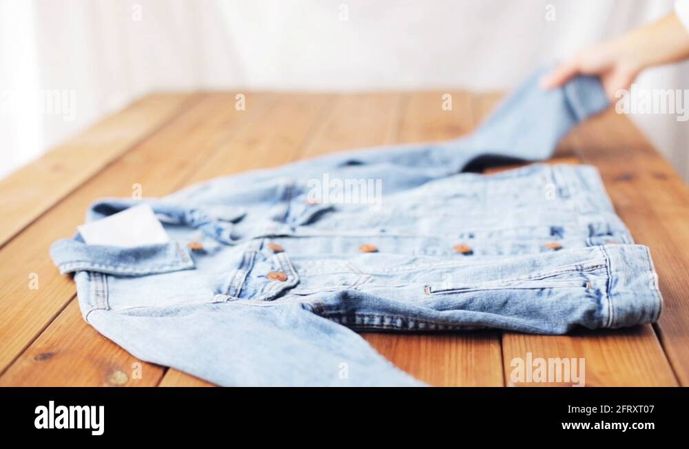 Denim on table Stock Videos & Footage - HD and 4K Video Clips - Alamy