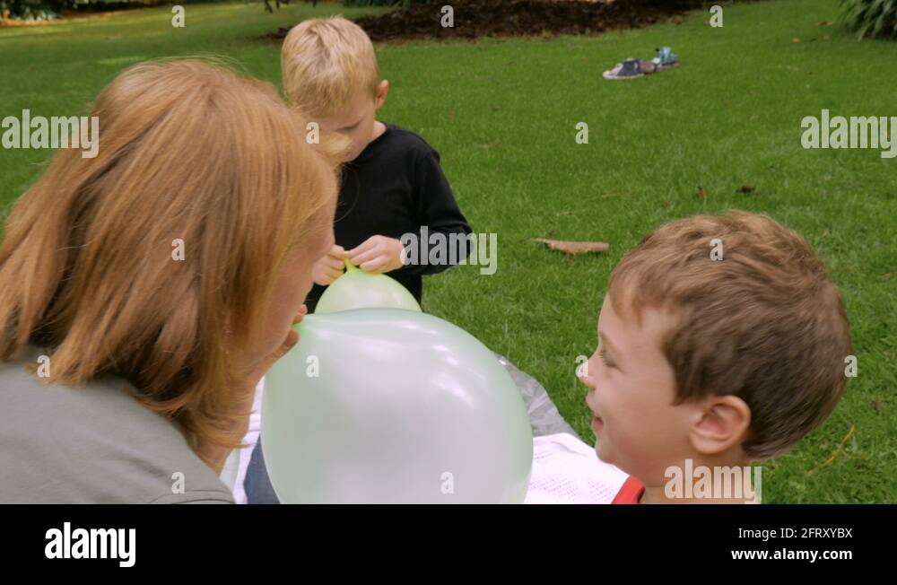 Boy blowing up balloon Stock Videos & Footage - HD and 4K Video Clips ...