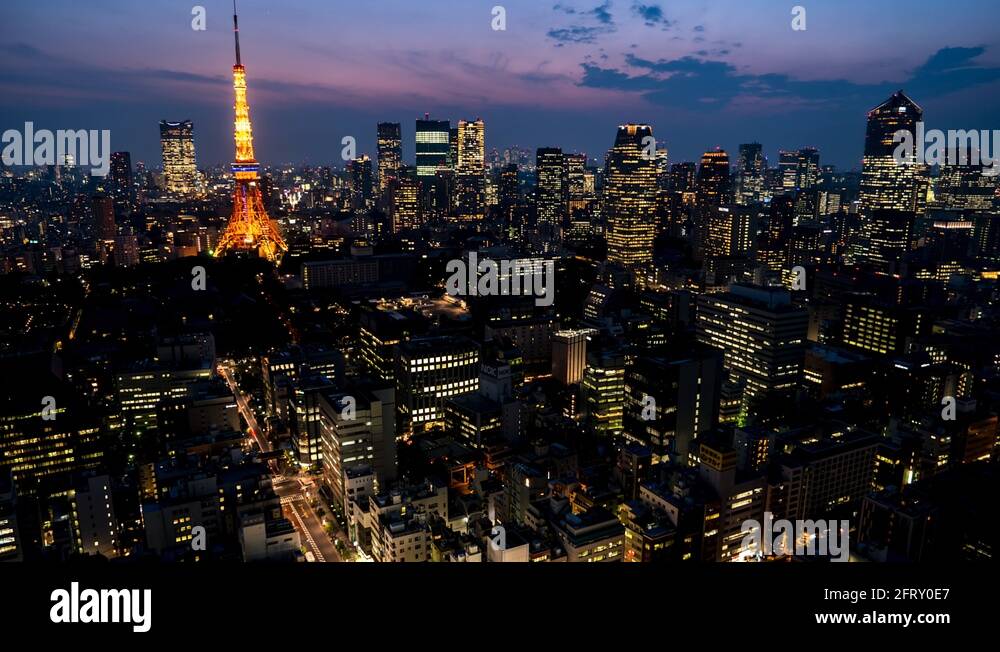 Night Tokyo city view with glowing Tokyo Tower. 4K resolution time ...