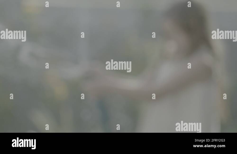 Girls spraying Stock Videos & Footage - HD and 4K Video Clips - Alamy