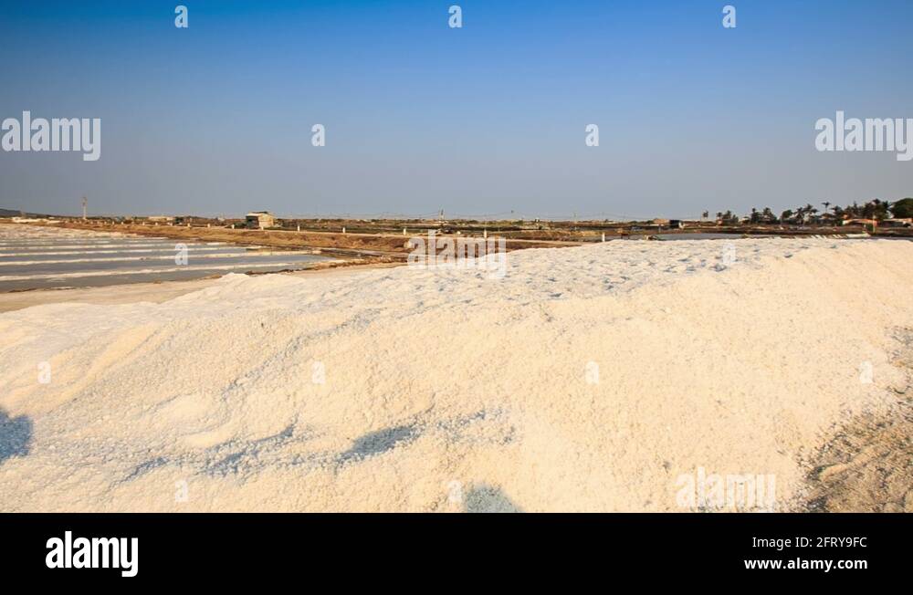 European Old Man Takes Photos of Salt Heaps Stock Video Footage - Alamy