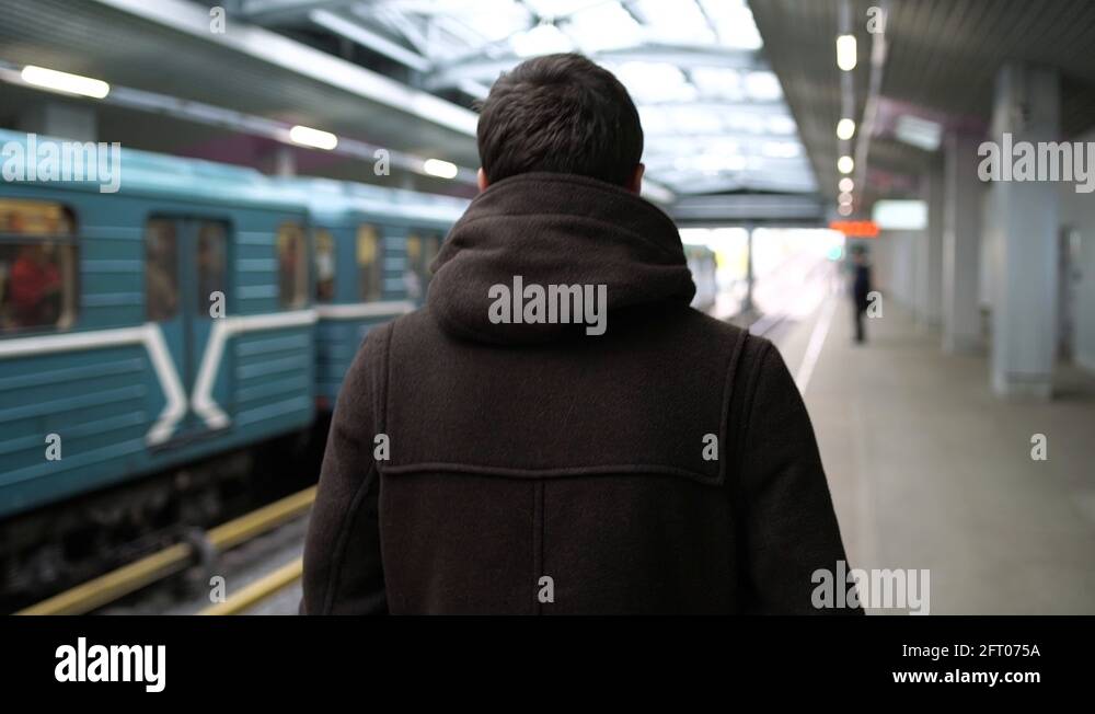 Man waiting train in Stock Videos & Footage - HD and 4K Video Clips - Alamy