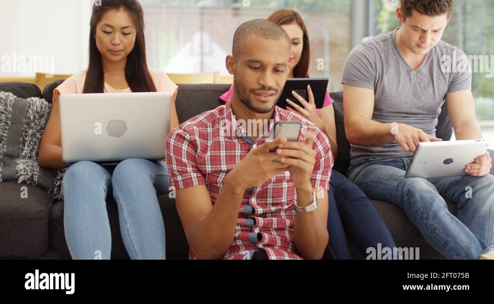 4k, Multi ethnic group of young people using technology Stock Video ...