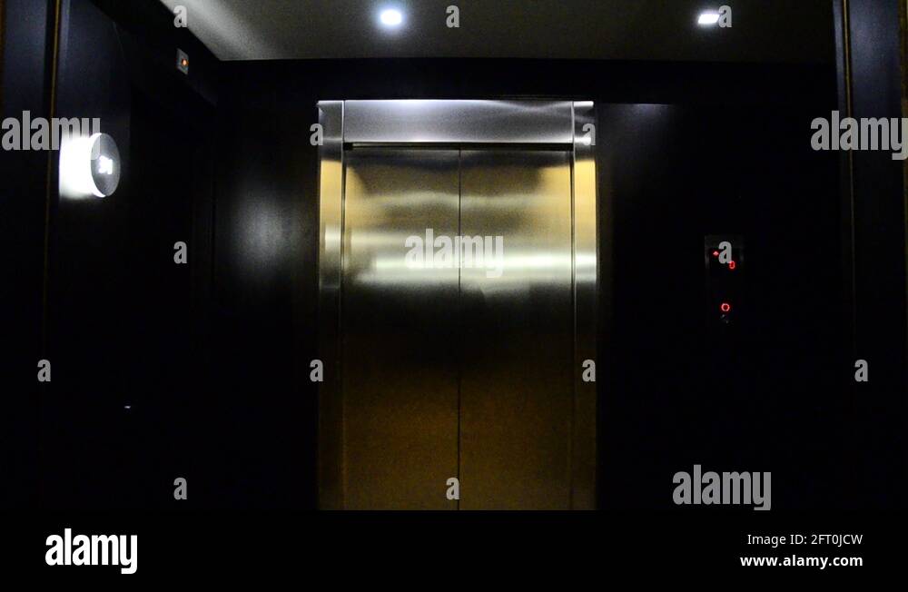 Elevator doors opening and closing Stock Video Footage - Alamy