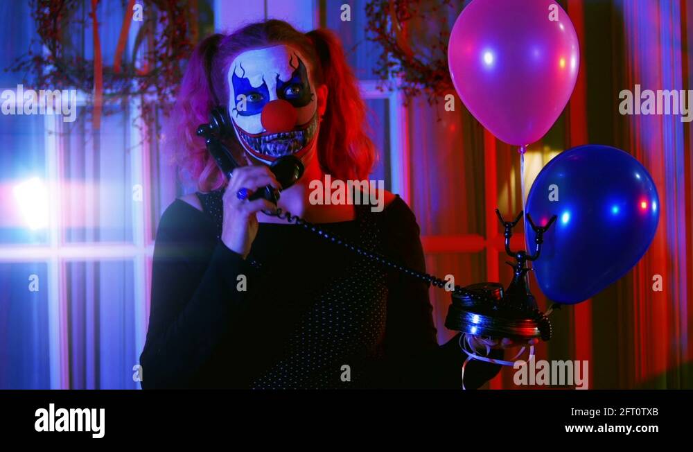 clown on phone talking creepy scary Stock Video Footage - Alamy