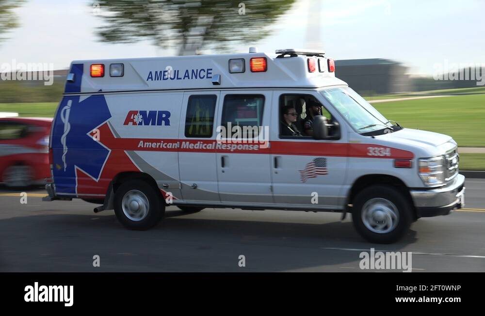 AMR ambulance races past, siren. DC began using AMR to transport ...