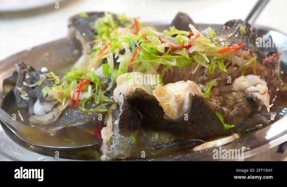 Steamed whole fish chinese dish Stock Videos & Footage - HD and 4K ...