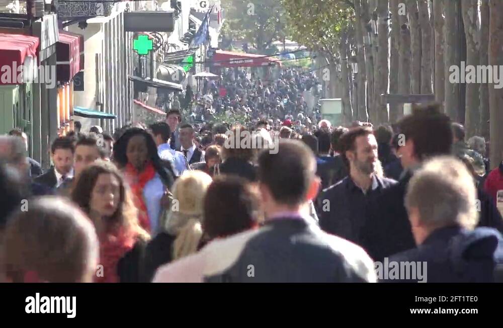 People walking on busy street, Champs-Elysees, Paris, France Stock ...