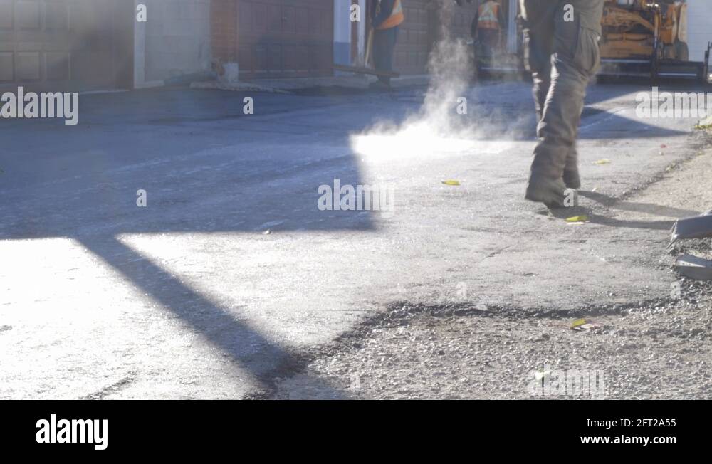 Pavement laying work Stock Videos & Footage - HD and 4K Video Clips - Alamy