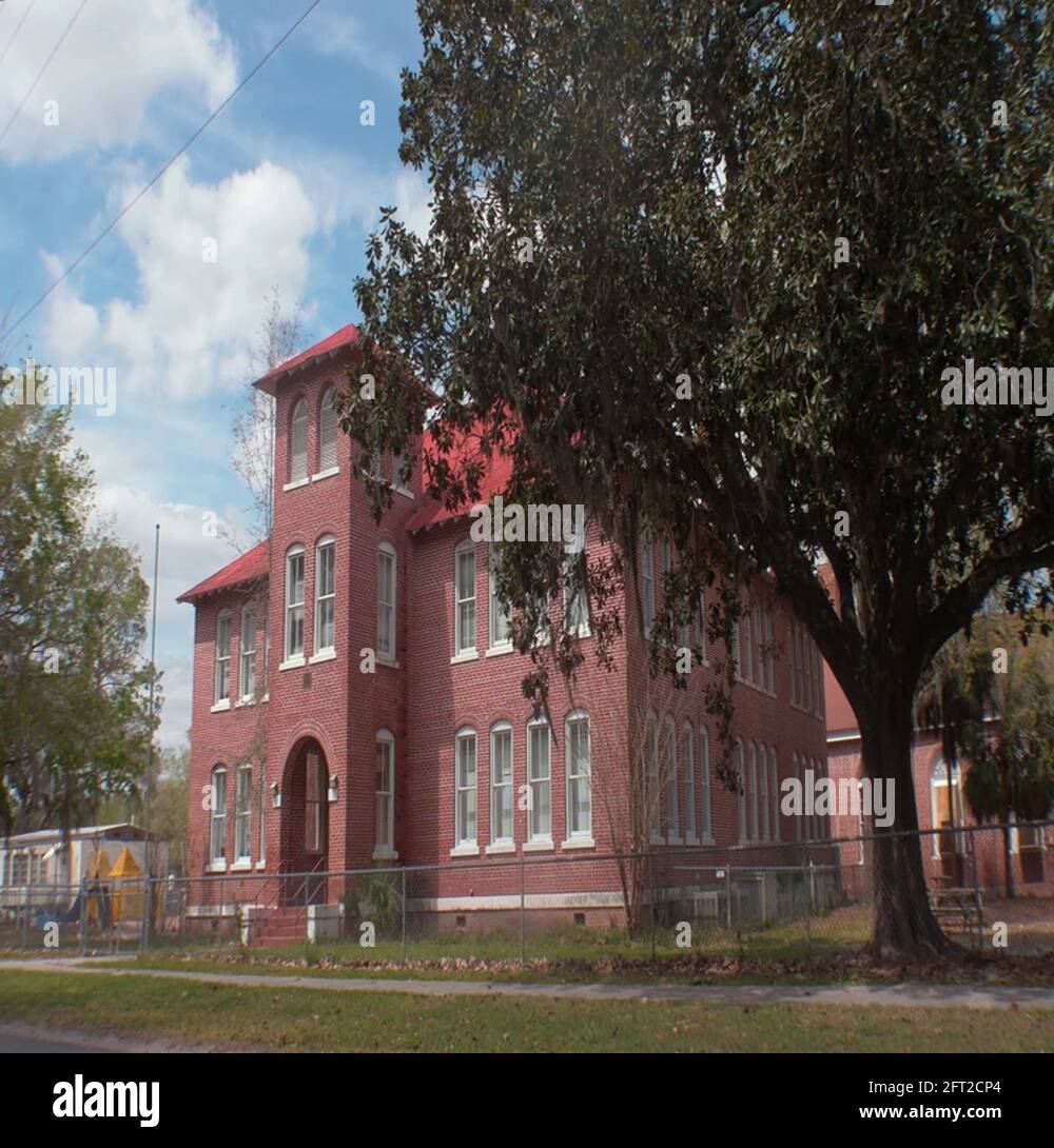 Old Brick School Building with Playground and School Buses, 4K Stock ...