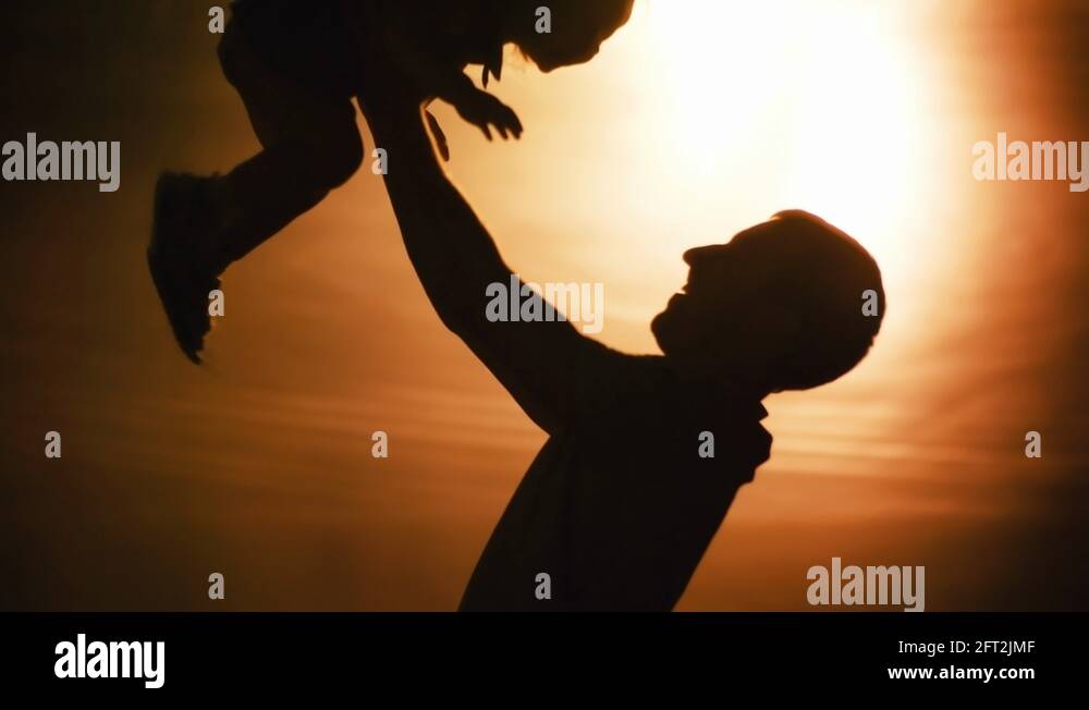 Shadow Figure of Father Playing with Daughter Stock Video Footage - Alamy