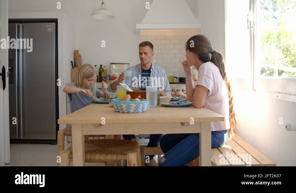 Family kids sitting around table Stock Videos & Footage - HD and 4K ...