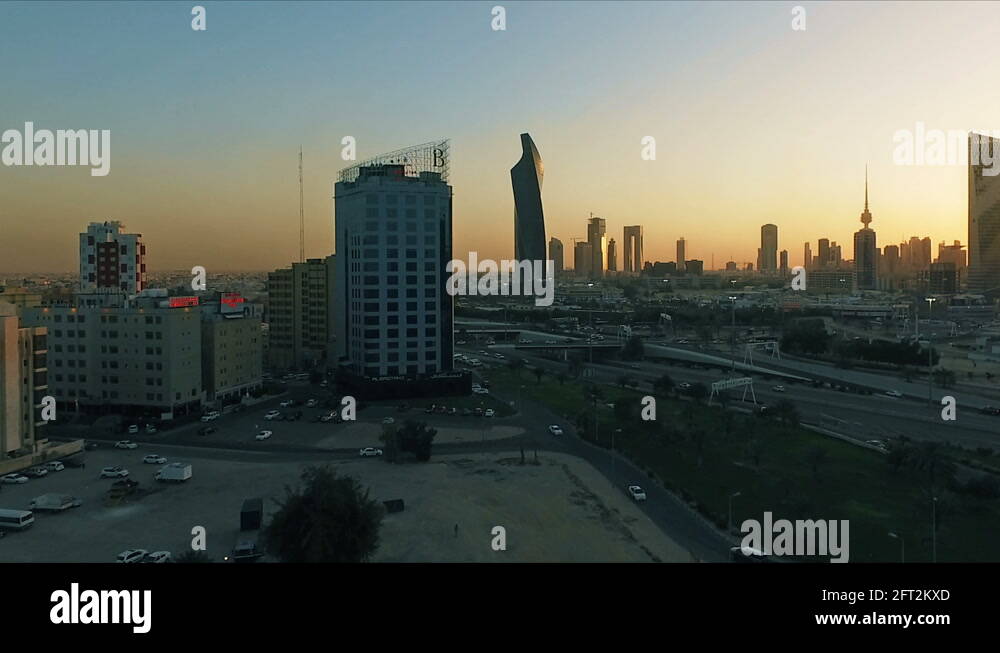 Kuwait skyline at sunset. Some famous places in Kuwait shooting from ...