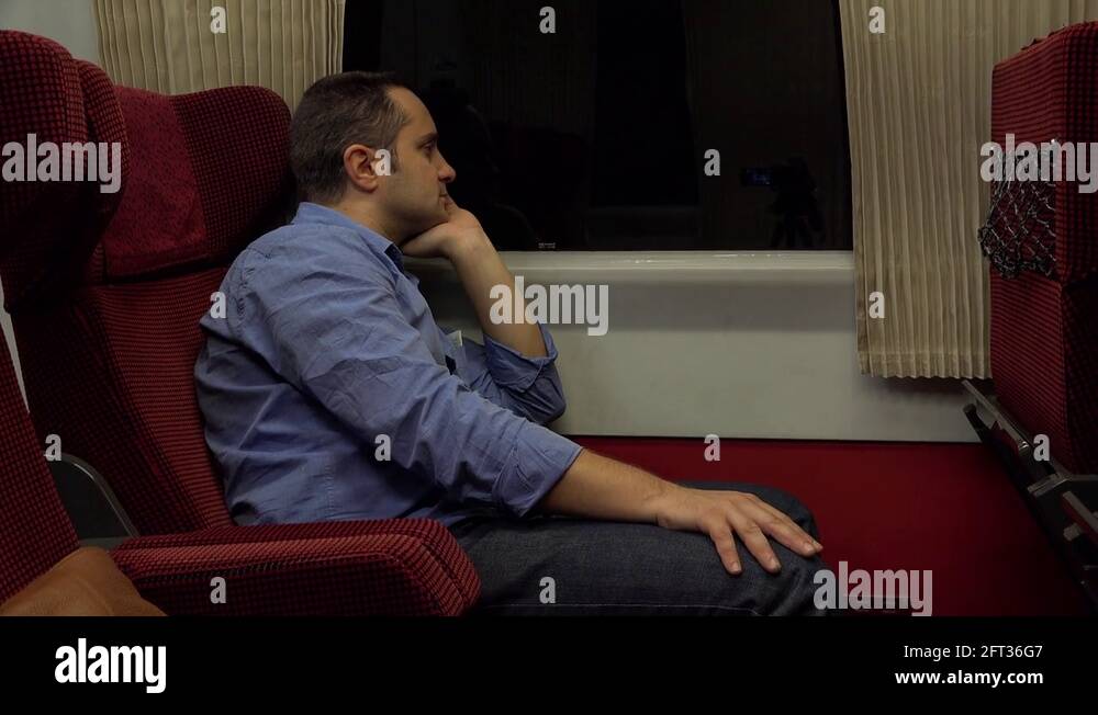 Man sitting on train Stock Videos & Footage - HD and 4K Video Clips - Alamy