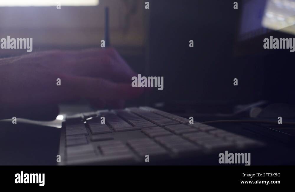 Typing hands and desktop computer keyboard Stock Video Footage - Alamy