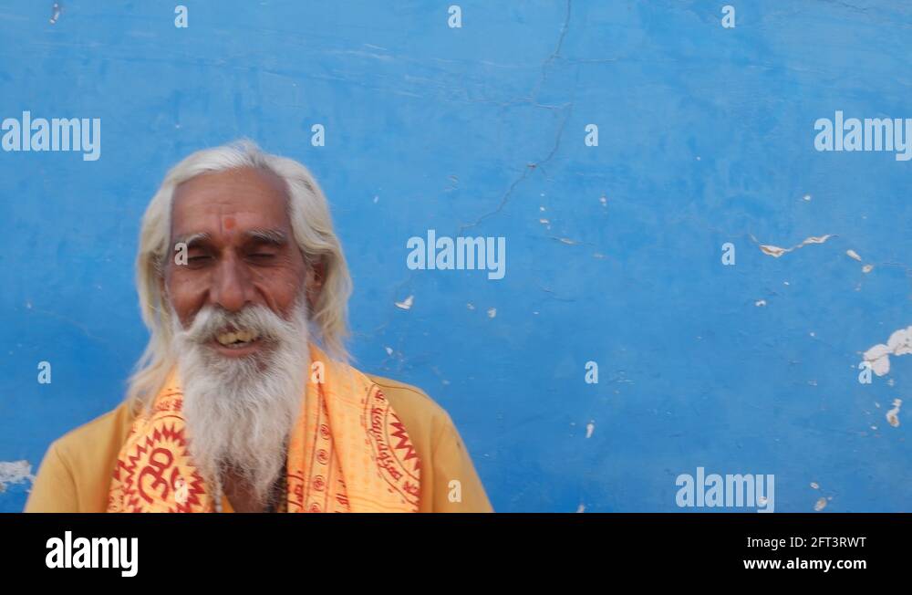 Hindu Sadhu, holy man, smiling and hands in namaste prayer mudra Stock ...