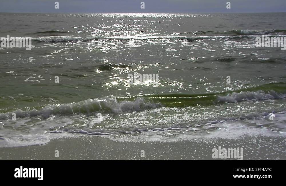 Surf breaking on beach Stock Videos & Footage - HD and 4K Video Clips ...