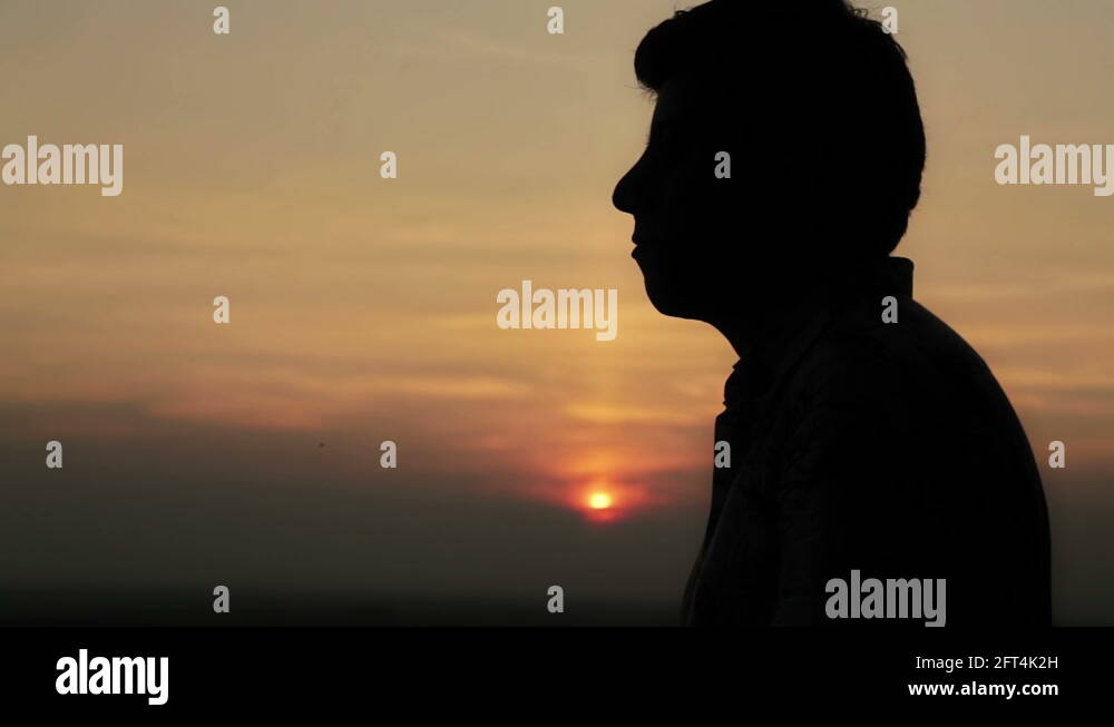 Man praying sunset Stock Videos & Footage - HD and 4K Video Clips - Alamy
