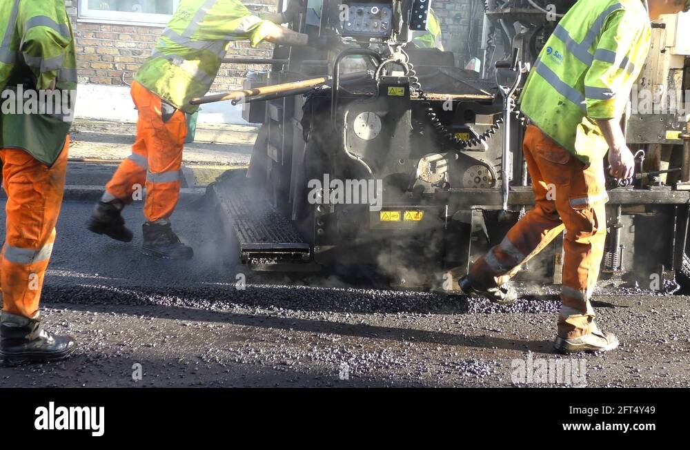 Man tarmac roller road Stock Videos & Footage - HD and 4K Video Clips ...
