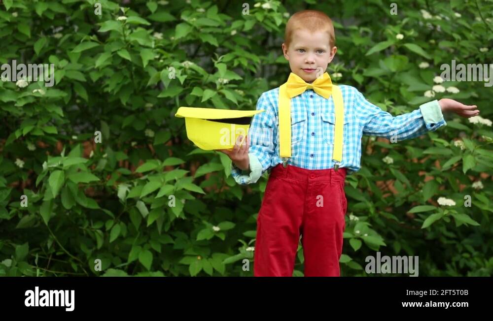 Boy putting on hat head Stock Videos & Footage - HD and 4K Video Clips - Alamy