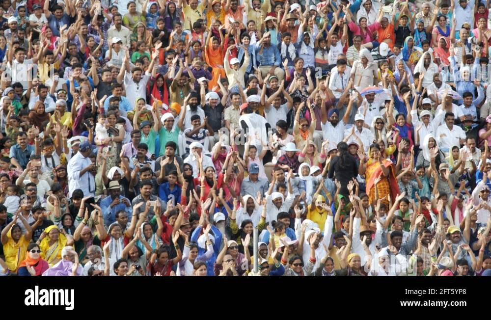 Colorful happy Indian audience clap, stadium, Wagah border ceremony ...