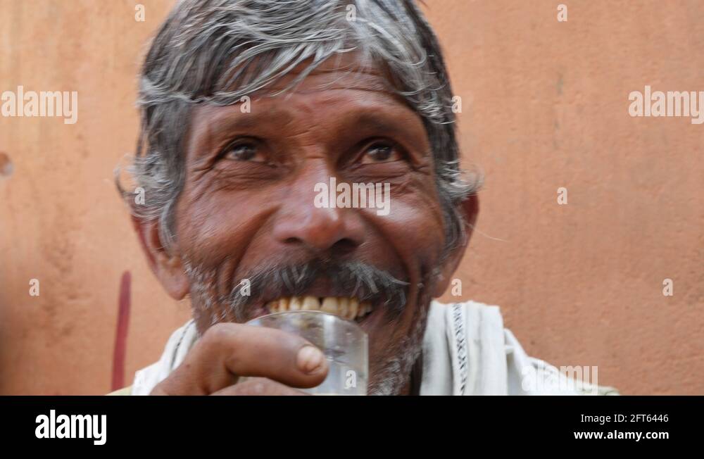 Indian man drinking Stock Videos & Footage - HD and 4K Video Clips - Alamy