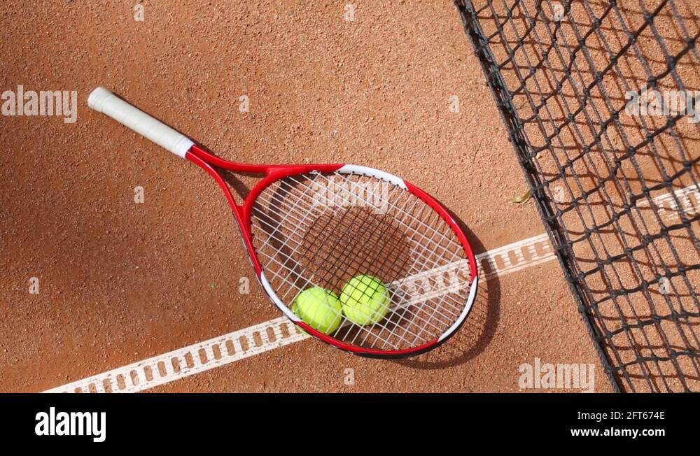 Tennis racket and balls lying on court Stock Videos & Footage - HD and ...