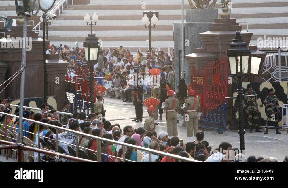 Indian and Pakistani soldiers perform march, Wagah border ceremony gate ...