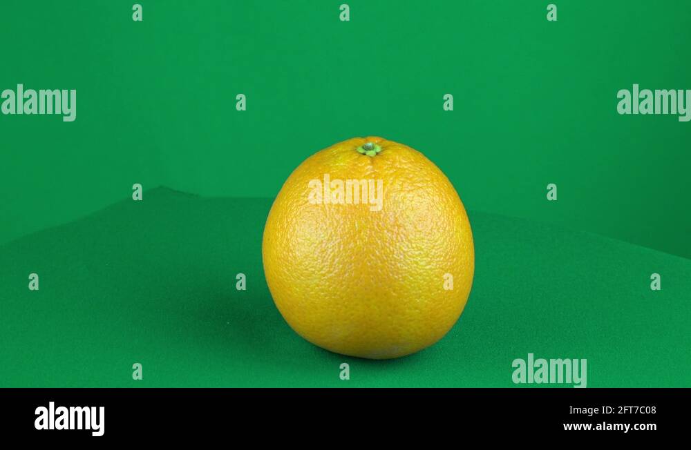 Orange Rotating in Green Screen Chroma Key Matte Stock Video Footage ...