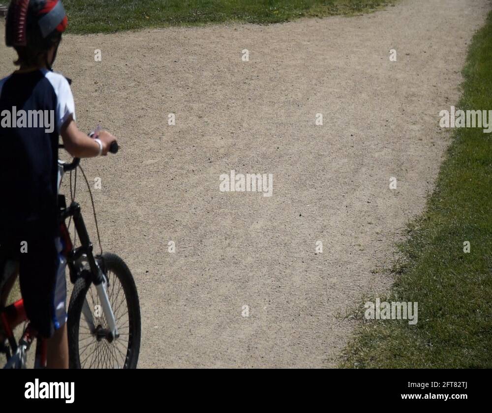 A young boy on a mountain bike Stock Videos & Footage - HD and 4K Video Clips - Alamy