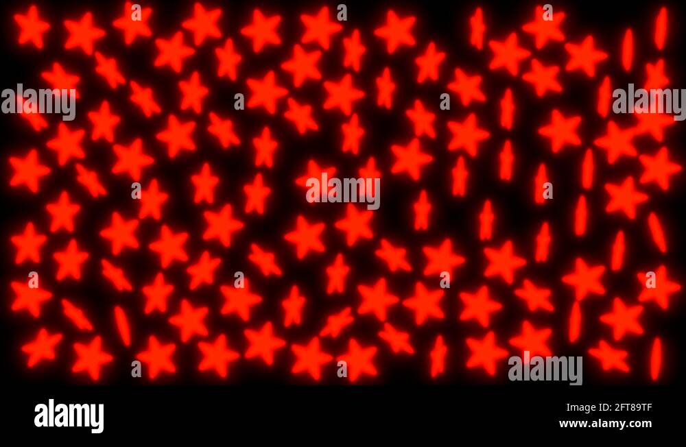 Animated spinning red glowing stars against black background b Stock ...