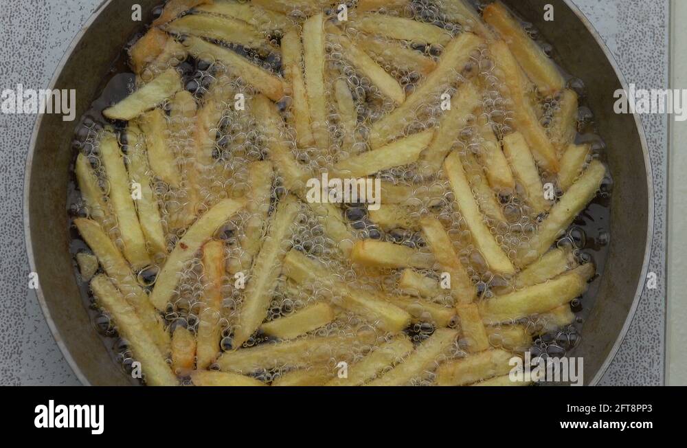 Deep fried fries Stock Videos & Footage - HD and 4K Video Clips - Alamy