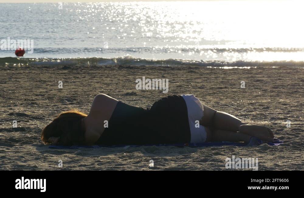 Sleeping on back beach Stock Videos & Footage - HD and 4K Video Clips ...