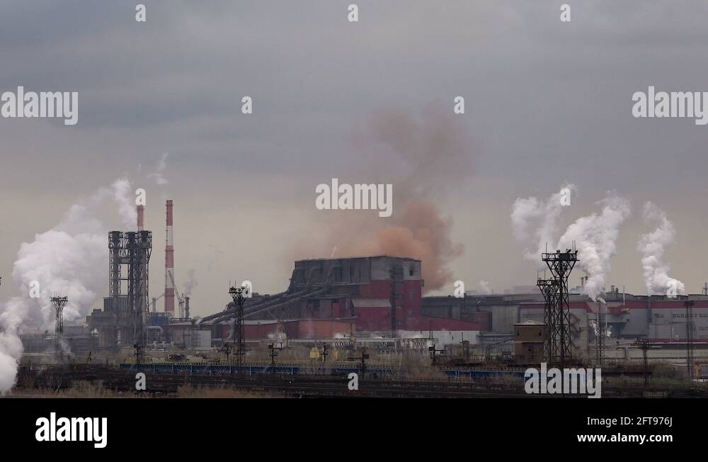 Atmospheric Air Pollution From Industrial Smoke Now. Pipes Steel Plant ...