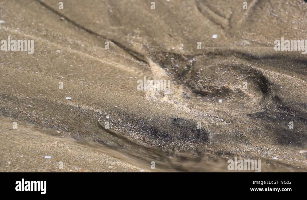 Rivulet beach sand Stock Videos & Footage - HD and 4K Video Clips - Alamy