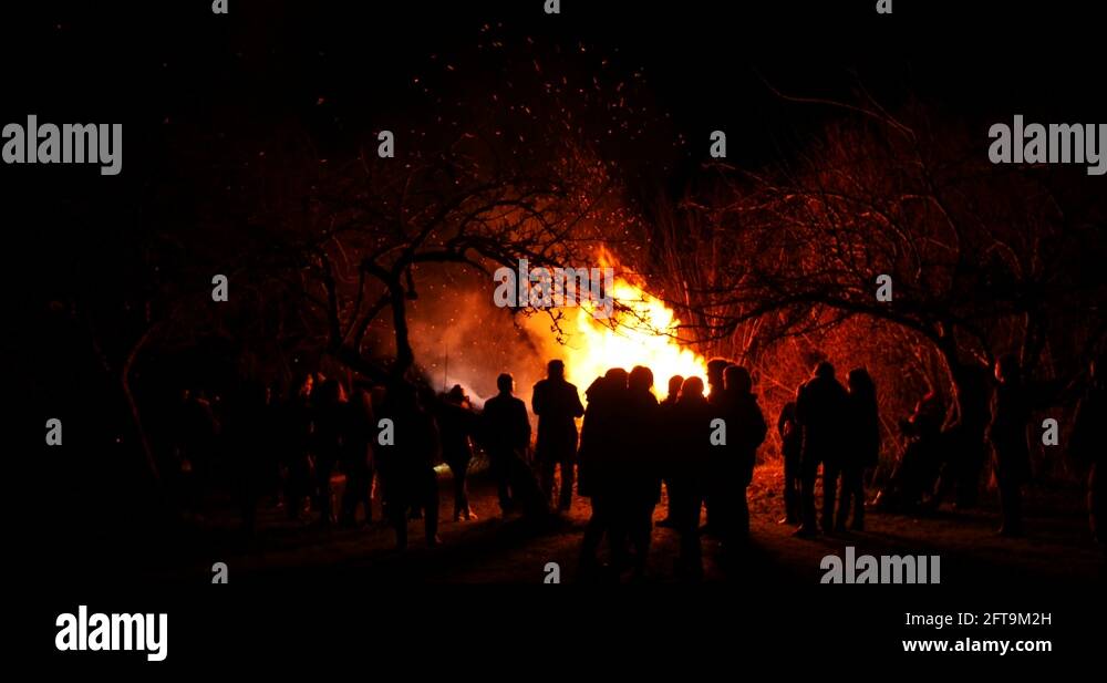 Crowd of People Around Fire, Silhouette of Figures & Trees with Flames ...