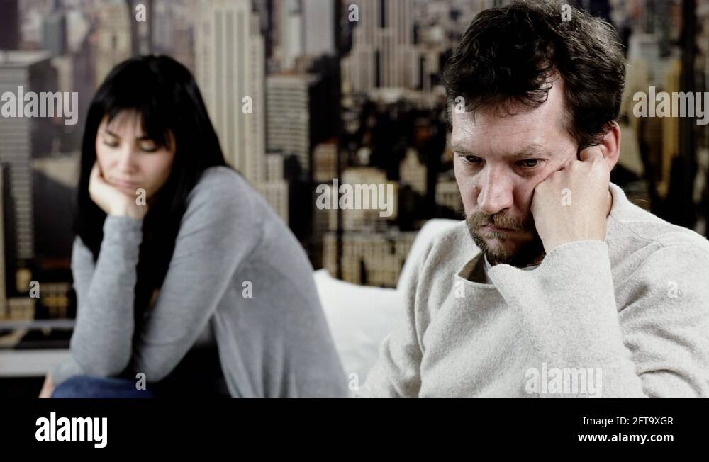 Sad lonely man almost crying after fight with girlfriend at home Stock ...