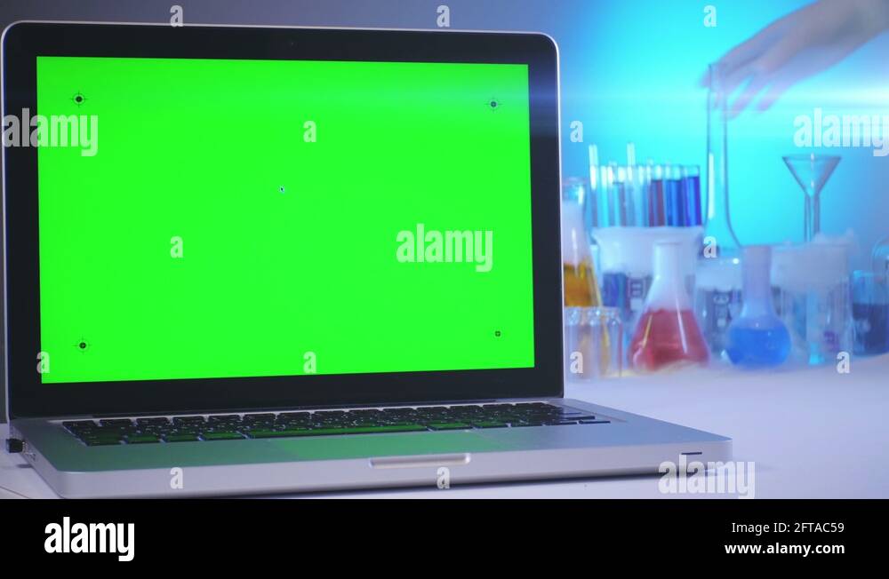 Laptop with a Green Screen in the Laboratory Stock Video Footage - Alamy