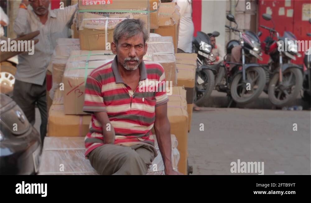 Man sitting on box Stock Videos & Footage - HD and 4K Video Clips - Alamy
