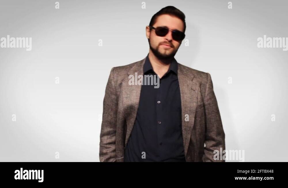 Slick man in suit Stock Videos & Footage - HD and 4K Video Clips - Alamy