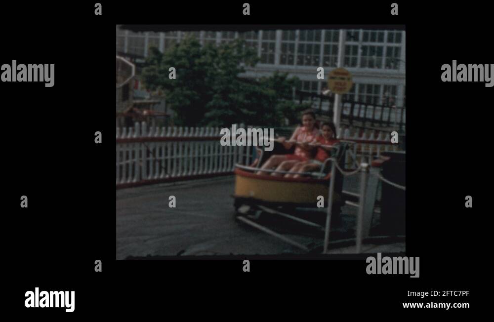 1957 Kids ride the Whip carnival ride at Atlantic City Boardwalk Stock ...