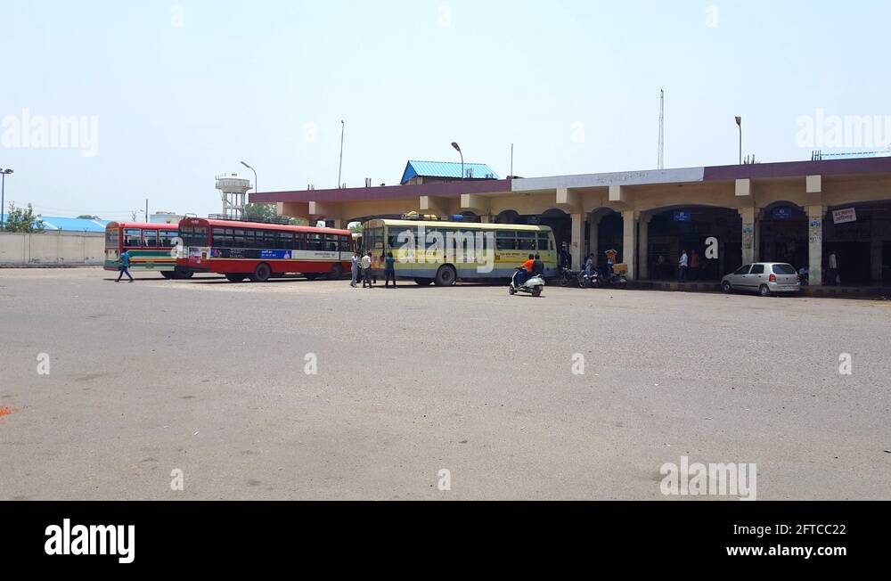 Outside Agra ISBT central bus station terminal, hot sunny day, India ...