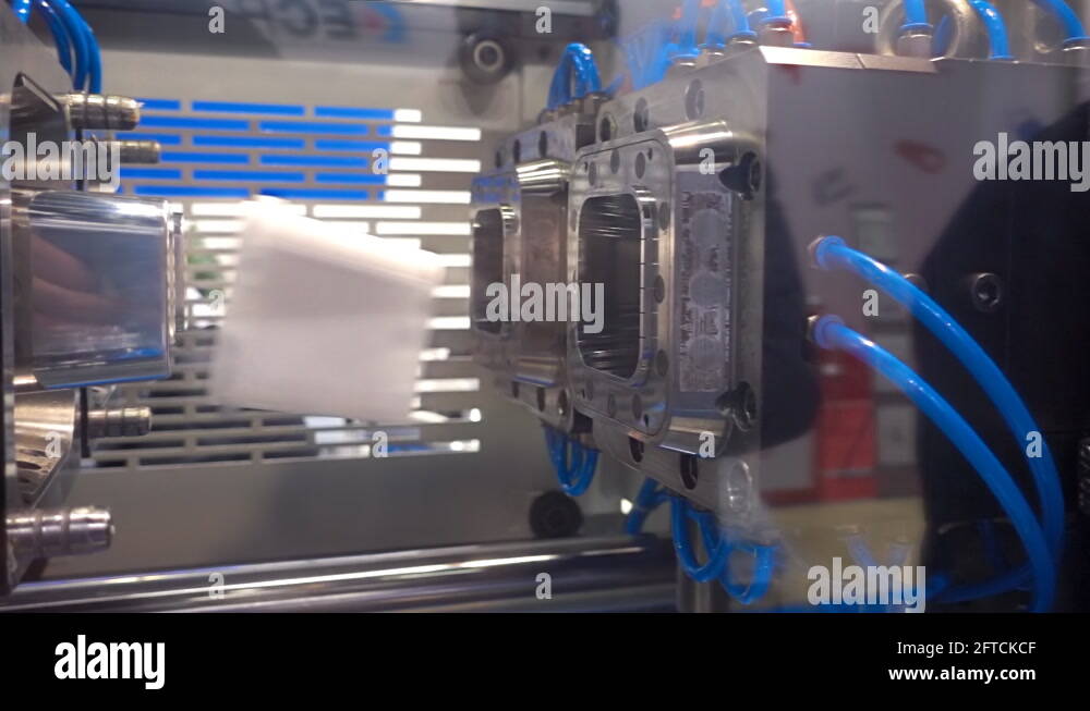 The process of extrusion of the disposable plastic products Stock Video ...